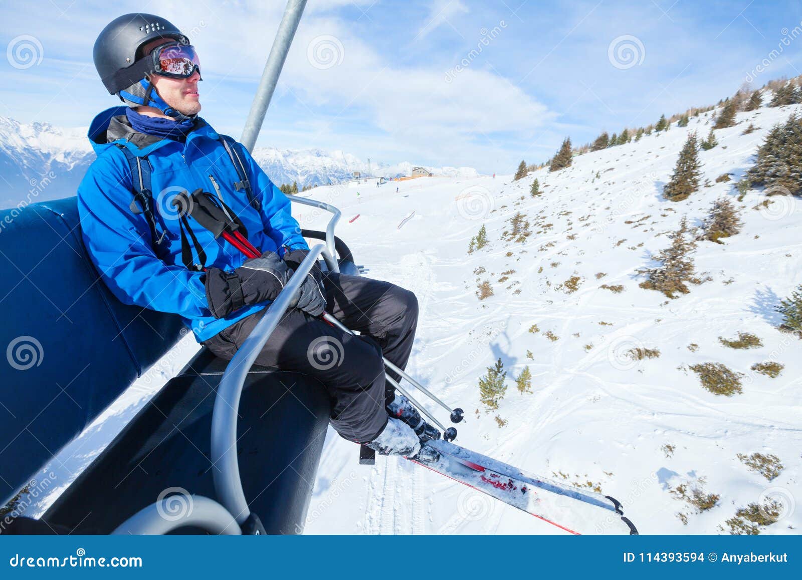 Happy Skier on Ski Lift Elevator in Winter Mountains Stock Photo ...