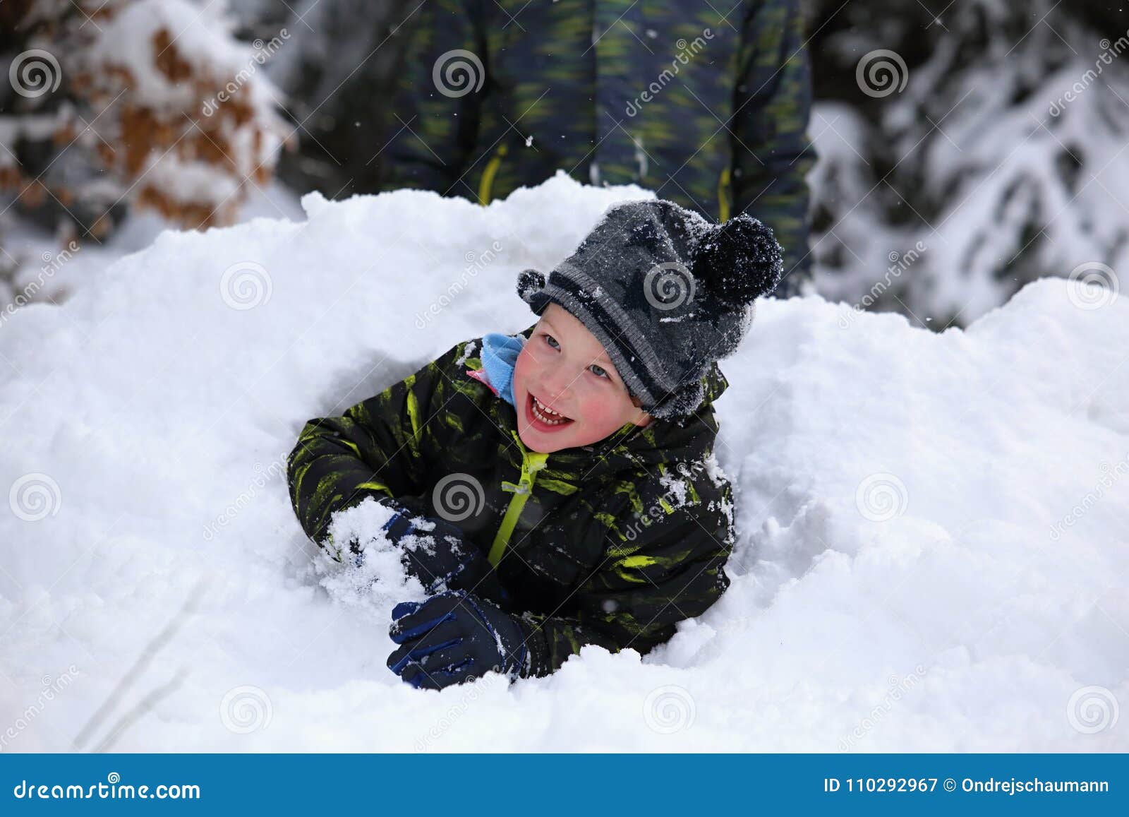 Happy Boy Digging Hole Out of Snow Pile Stock Image - Image of forest ...