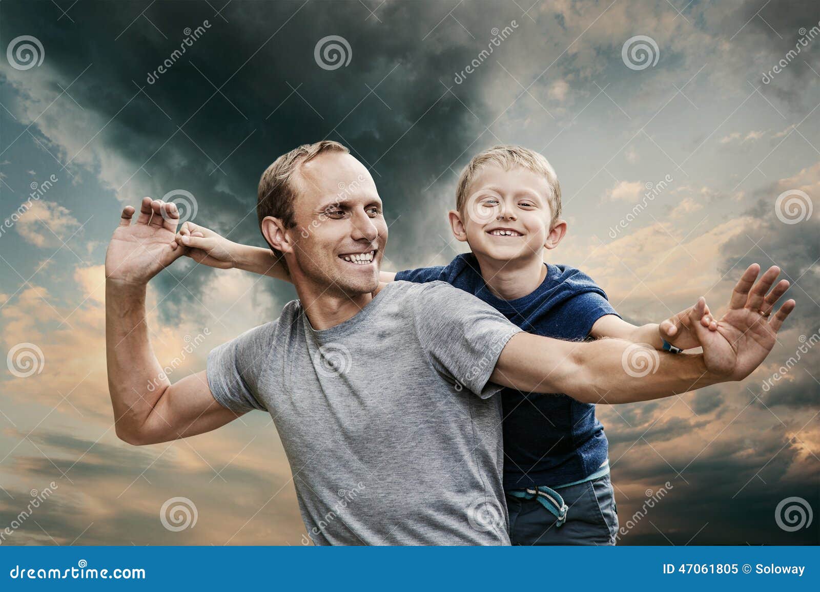 Happy Smiling Son with Father Portrait on the Cold Tones Sky Stock ...