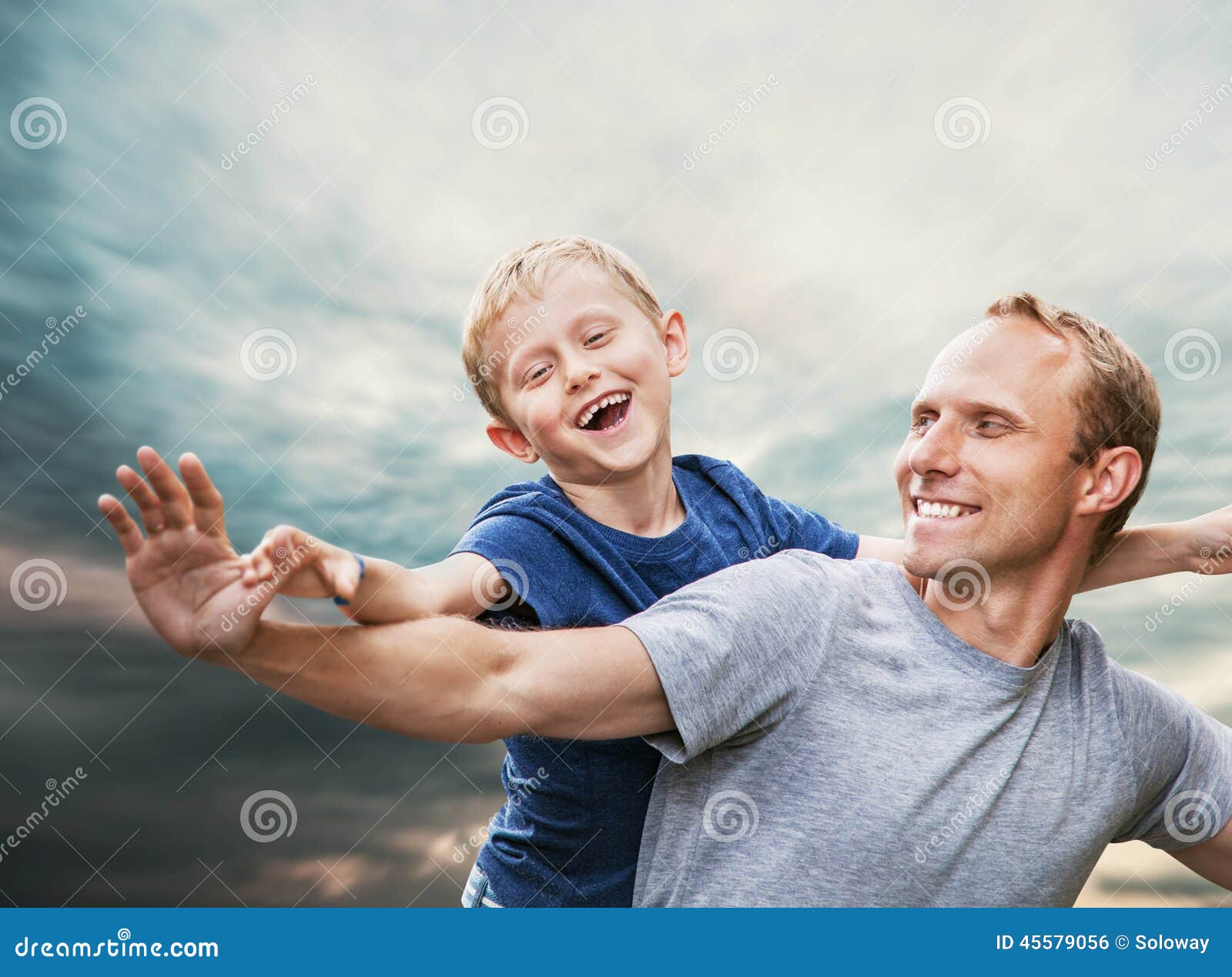 Happy Smiling Son and Father Portrait Over Blue Sky Stock Photo - Image ...