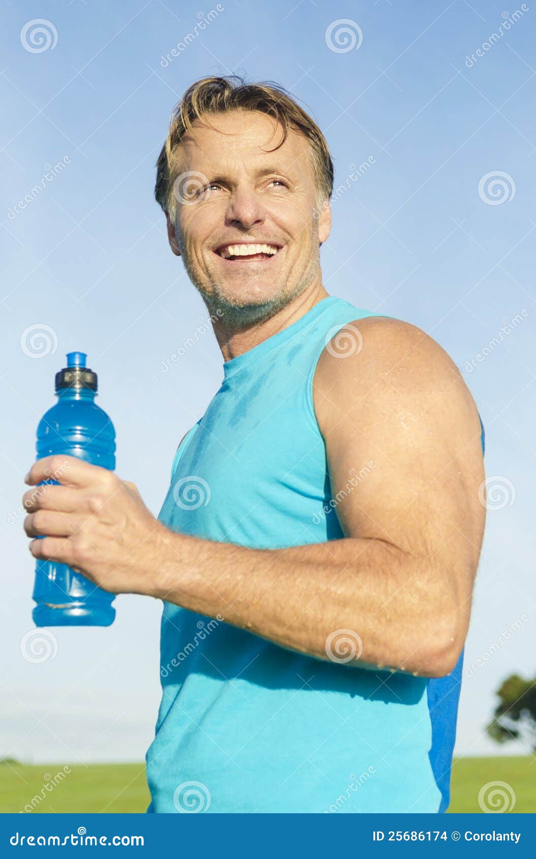 Happy smiling sportsman stock photo. Image of blue, muscular - 25686174