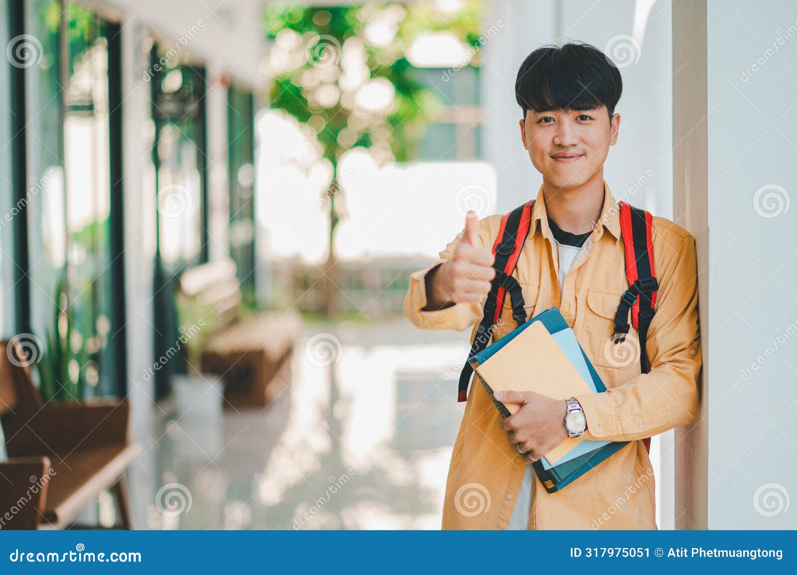 Happy Smiling Student with Book in Hand on Campus while Going To Study ...