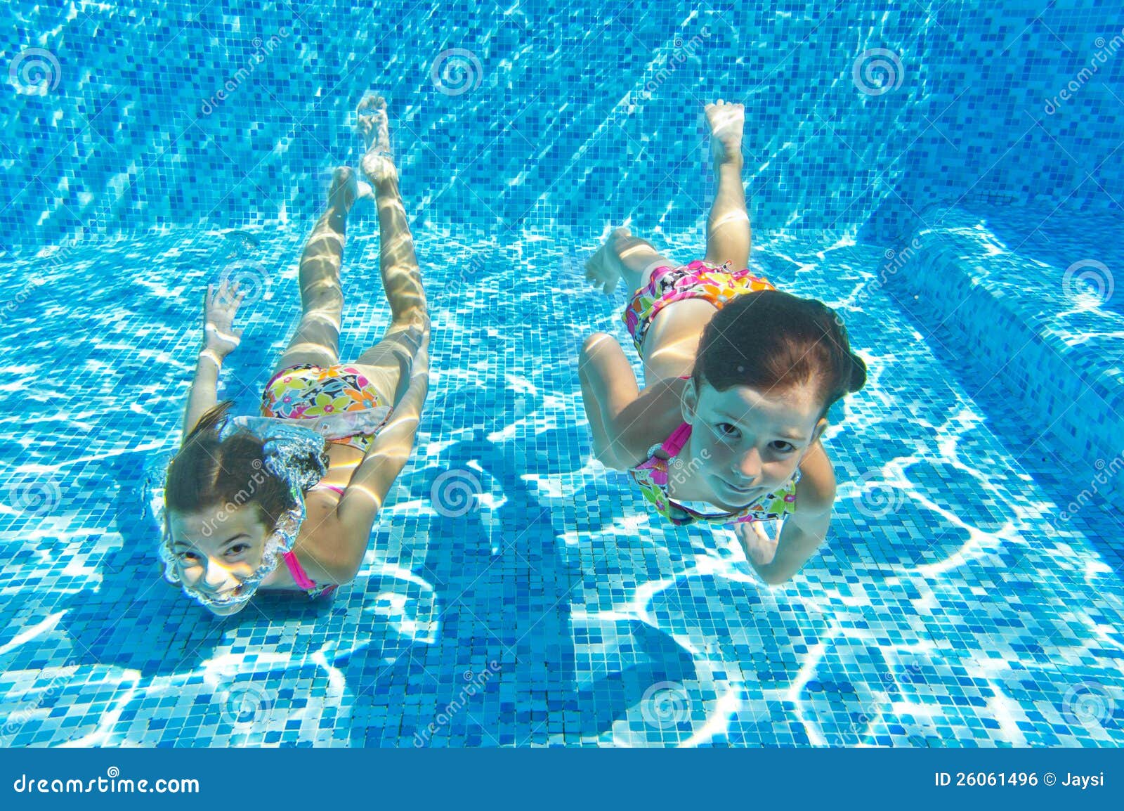 Happy Smiling Underwater Children In Swimming Pool Stock Photo - Image ...