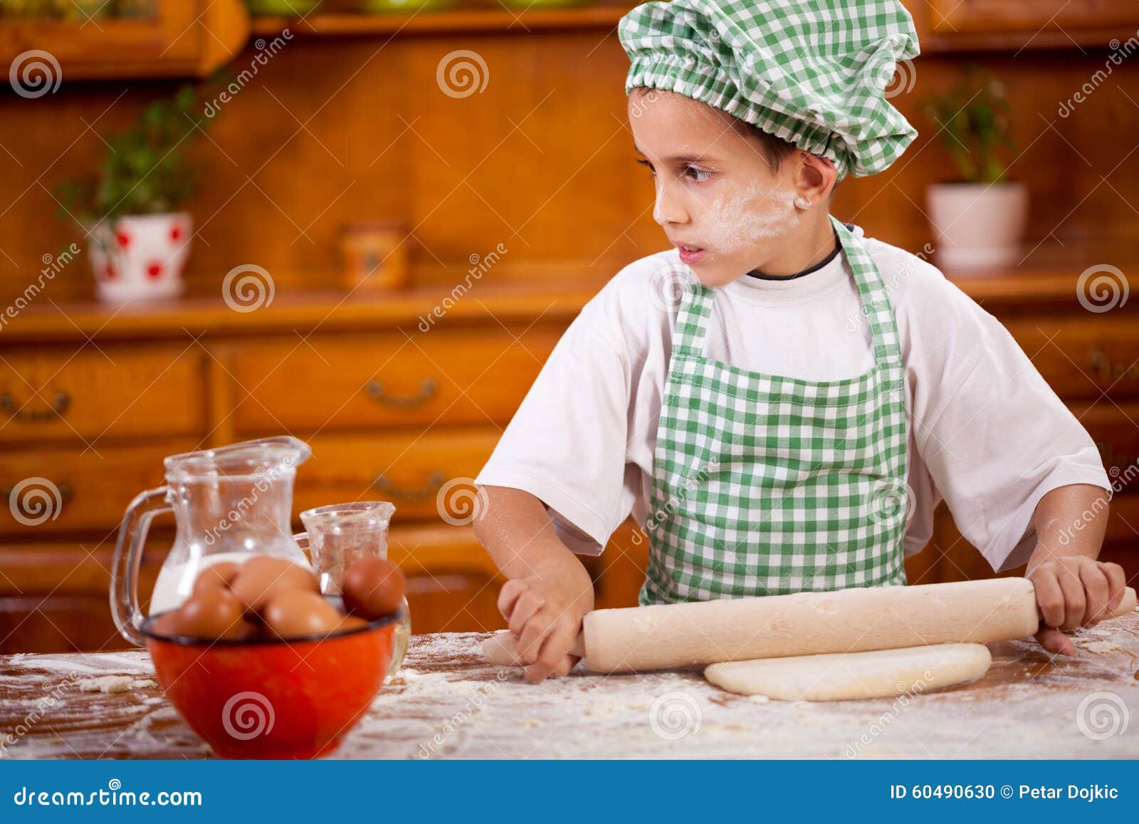 Happy Smiling Young Boy Chef in Kitchen Making Dough with Rollin Stock ...