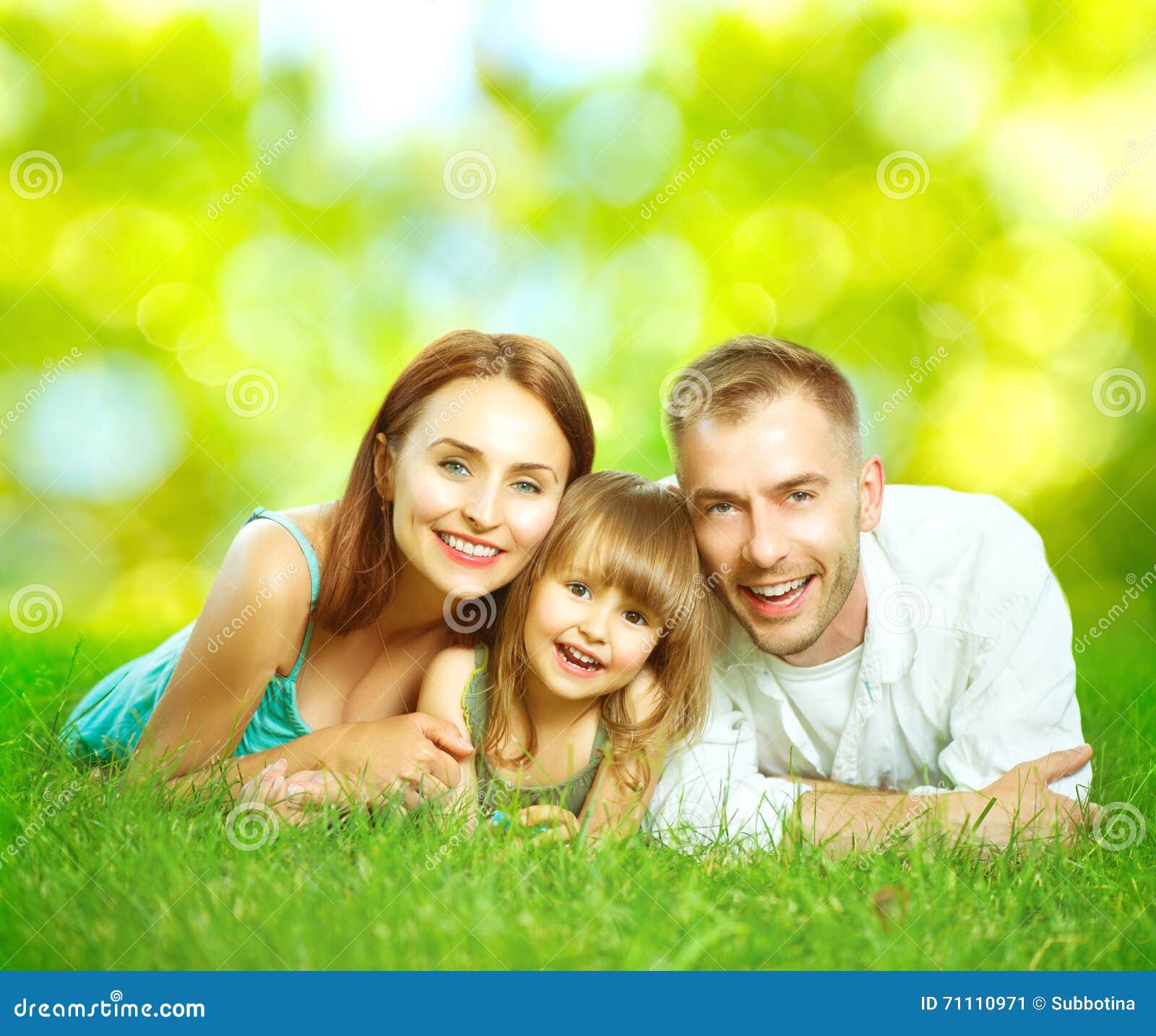 Happy Smiling Young Family Outdoors Stock Image - Image of lying, love ...