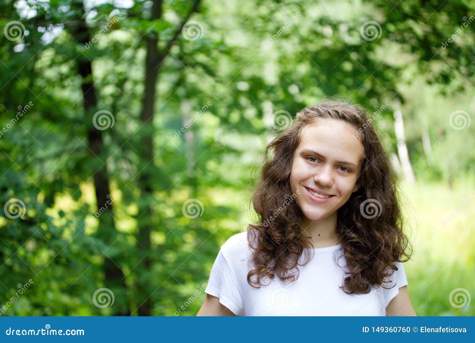 Happy Smiling Young Girl Portrait in a Green Nature Park Stock Photo ... Happy Smiling Young Girl Portrait in a Green Nature Park Stock Photo ...