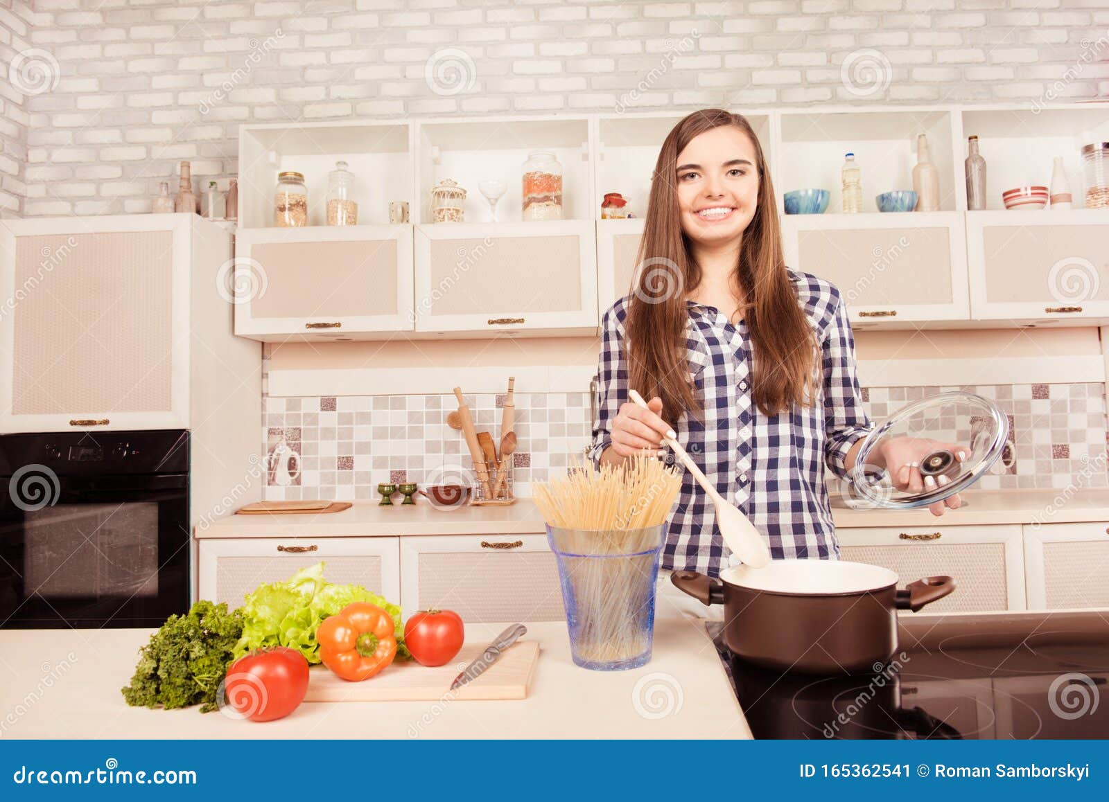 Happy Smiling Young Woman Cook in the Kitchen Stock Image - Image of ...