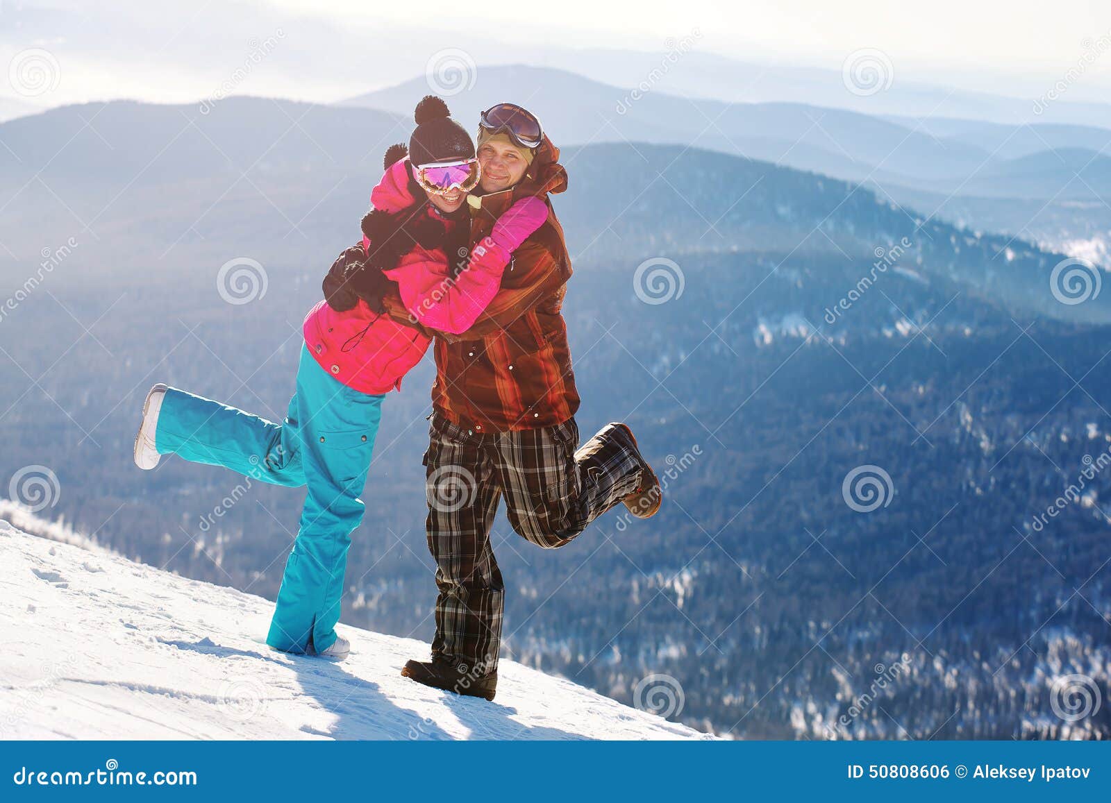 Happy snowboarding couple stock photo. Image of hobbies - 50808606