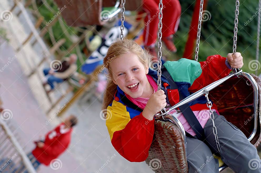 Happy spinning girl stock image. Image of merry, action - 1100947
