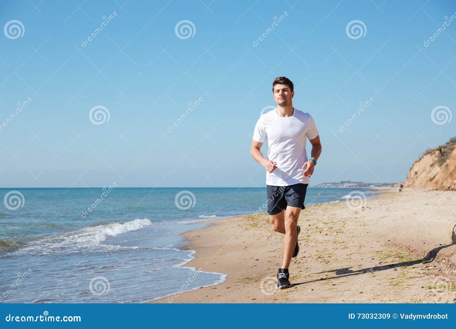 Happy Sportsman Running on the Beach Stock Image - Image of adult ...