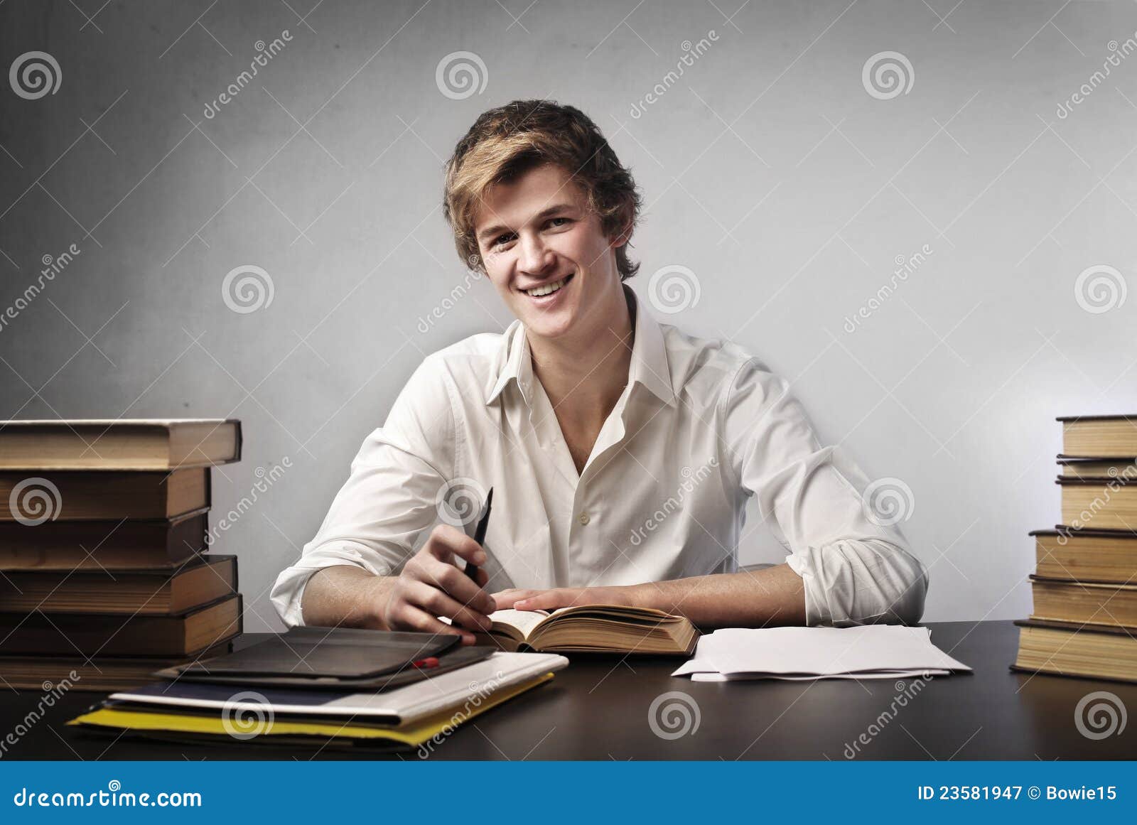 Happy student stock image. Image of desk, notebook, caucasian - 23581947