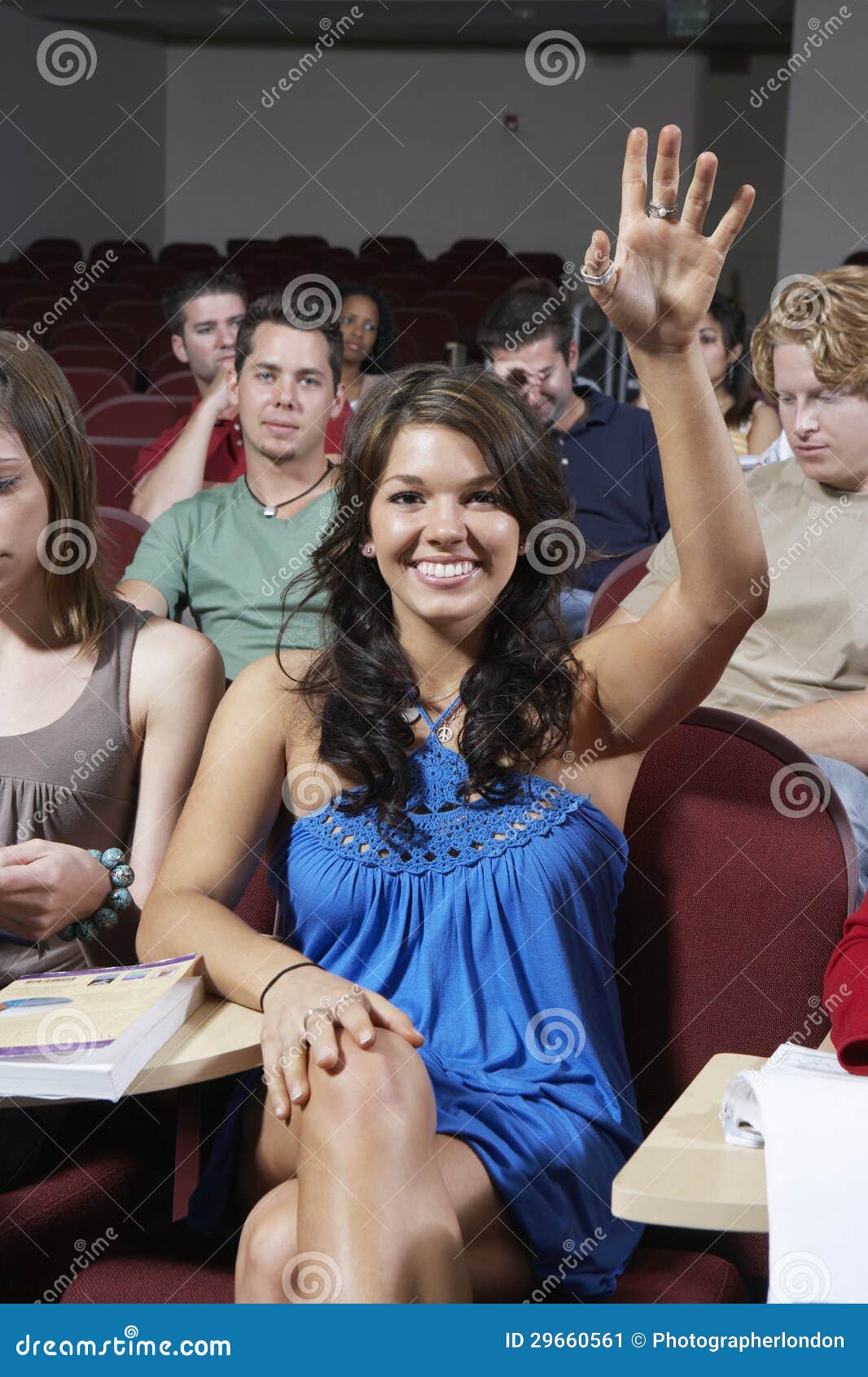 Happy Student Answering in Class Stock Image - Image of classroom ...
