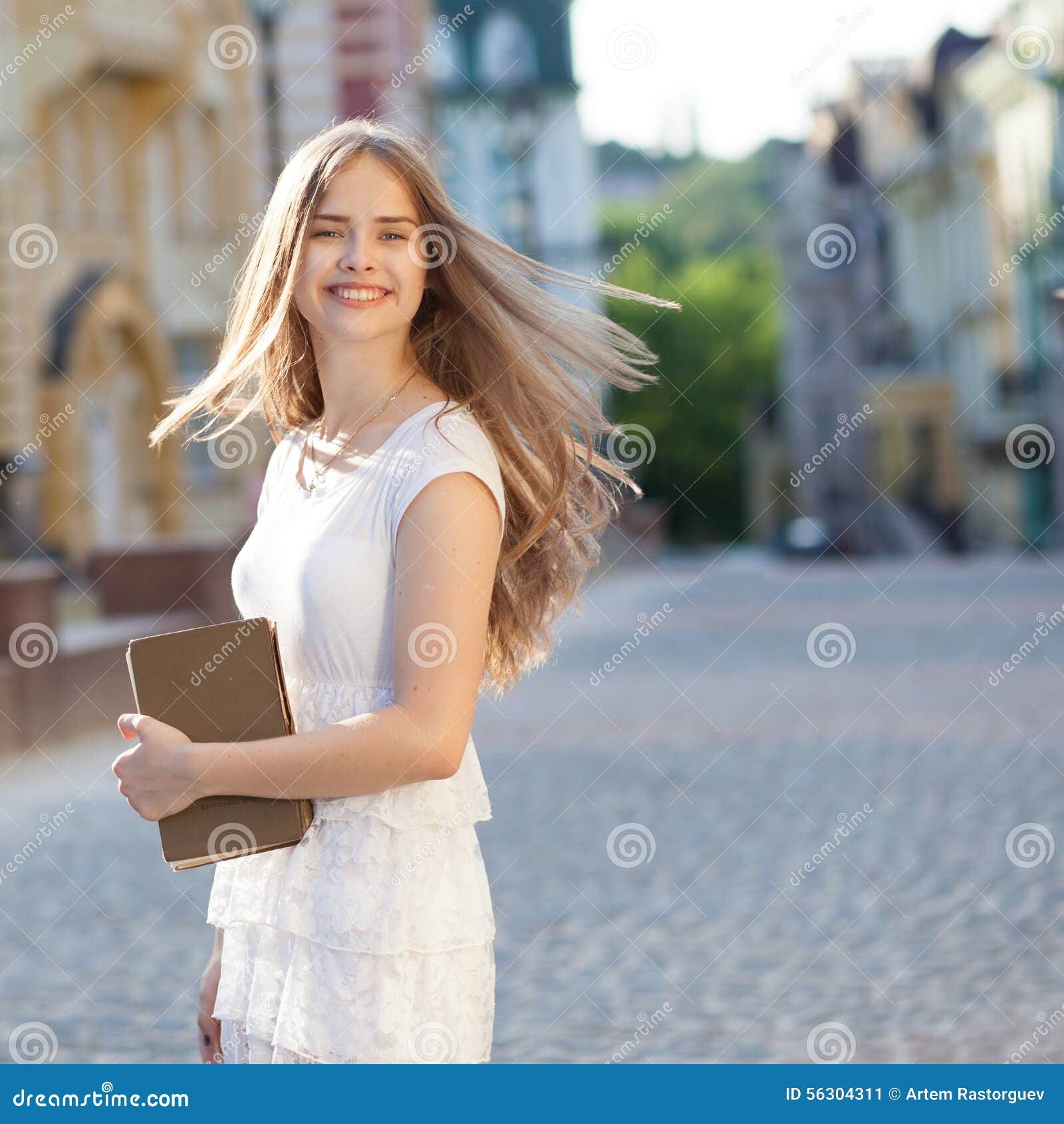 Happy student with book stock image. Image of casual - 56304311