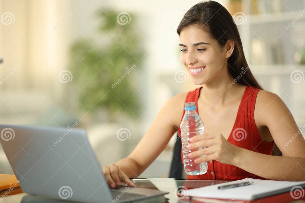 Happy Student Drinking Water E-learning at Home Stock Photo - Image of hydrate, graduate: 318938250