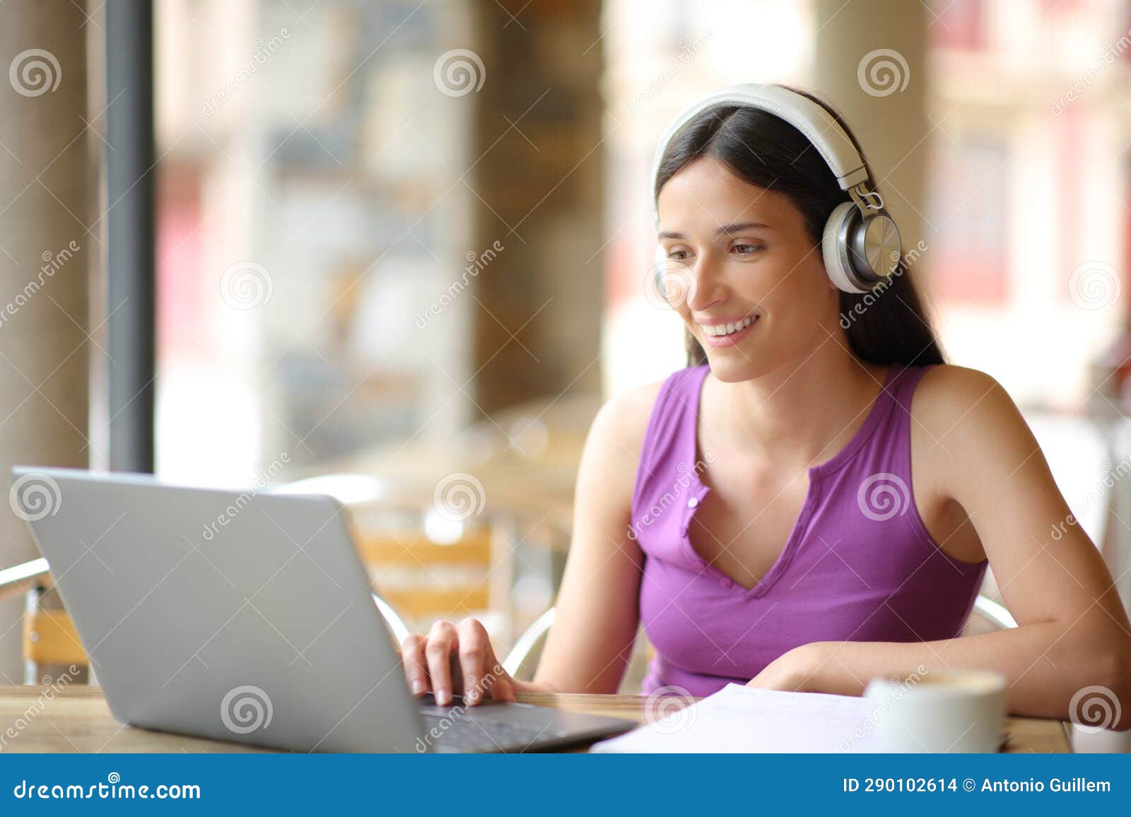 Happy Student E-learning in a Coffee Shop Terrace Stock Photo - Image of class, music: 290102614