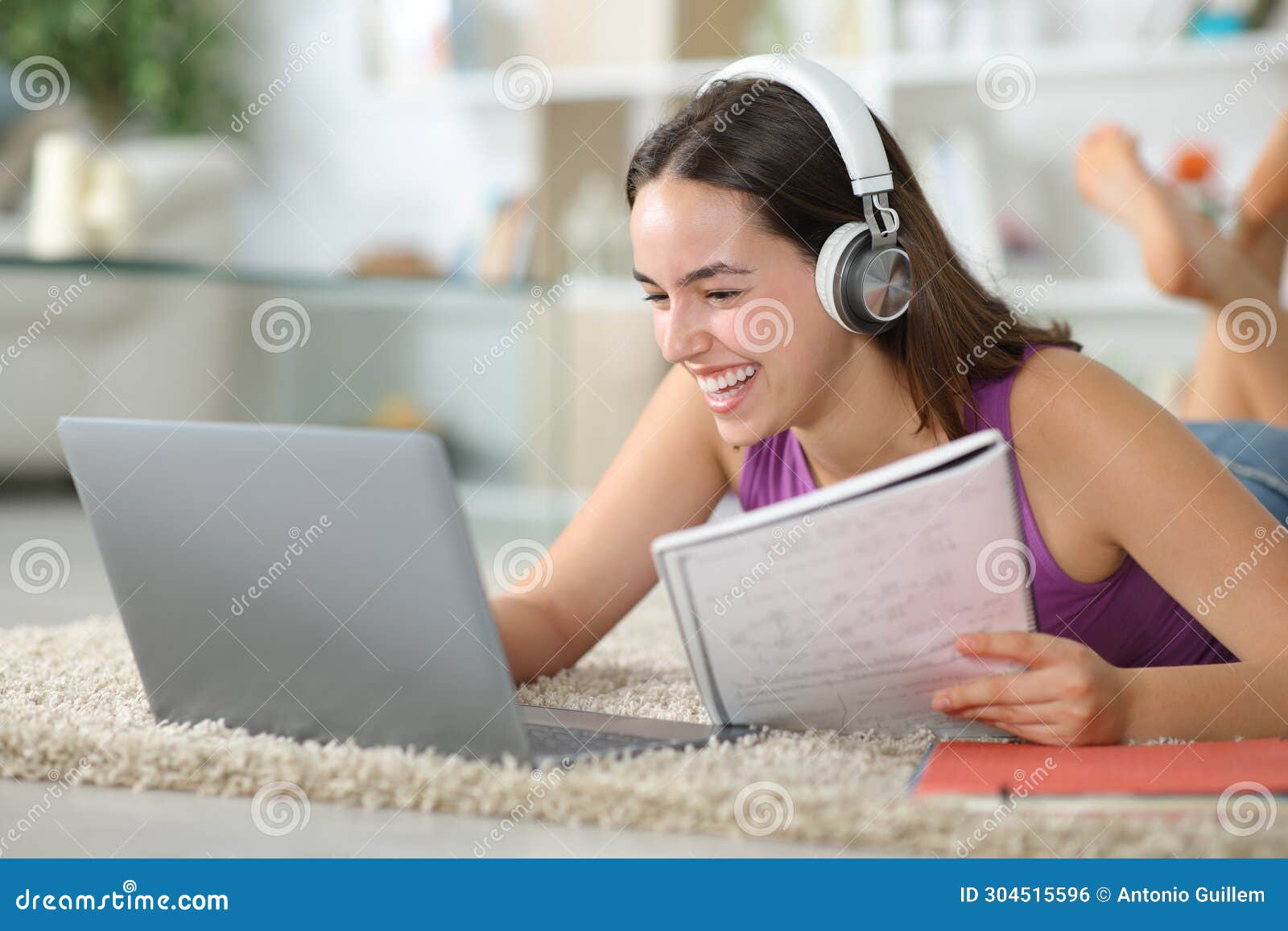 Happy Student E-learning Using Headphone and Laptop Stock Photo - Image ...