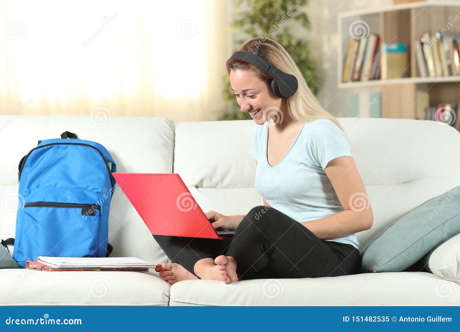 Happy Student E Learning Using Laptop and Headphones Stock Image ...