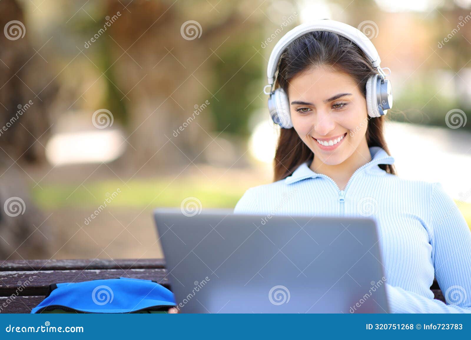 Happy Student Elearning Online in a Park Stock Photo - Image of music ...