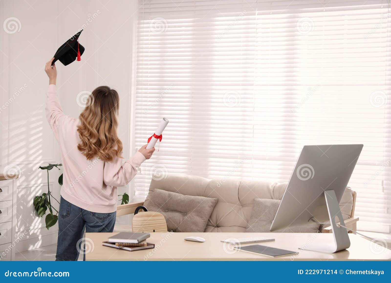 Happy Student with Graduation Hat and Diploma at Workplace in Office ...