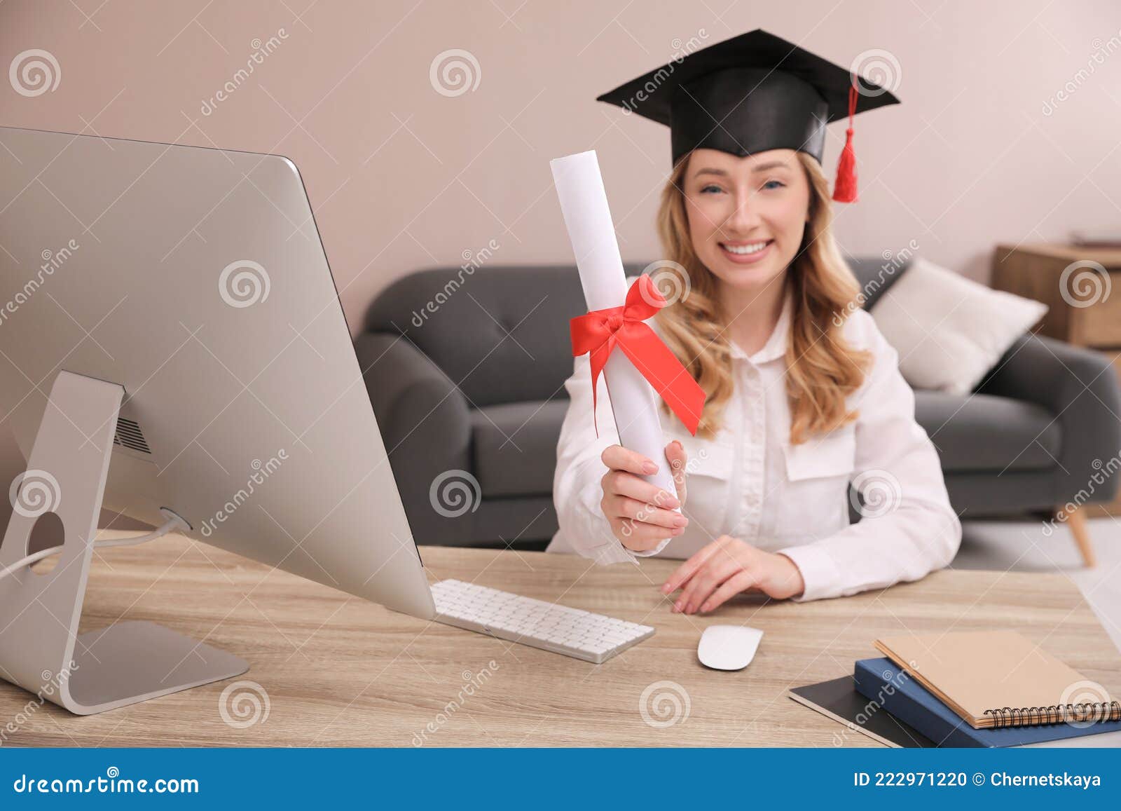Happy Student with Graduation Hat at Workplace in Office Stock Photo ...