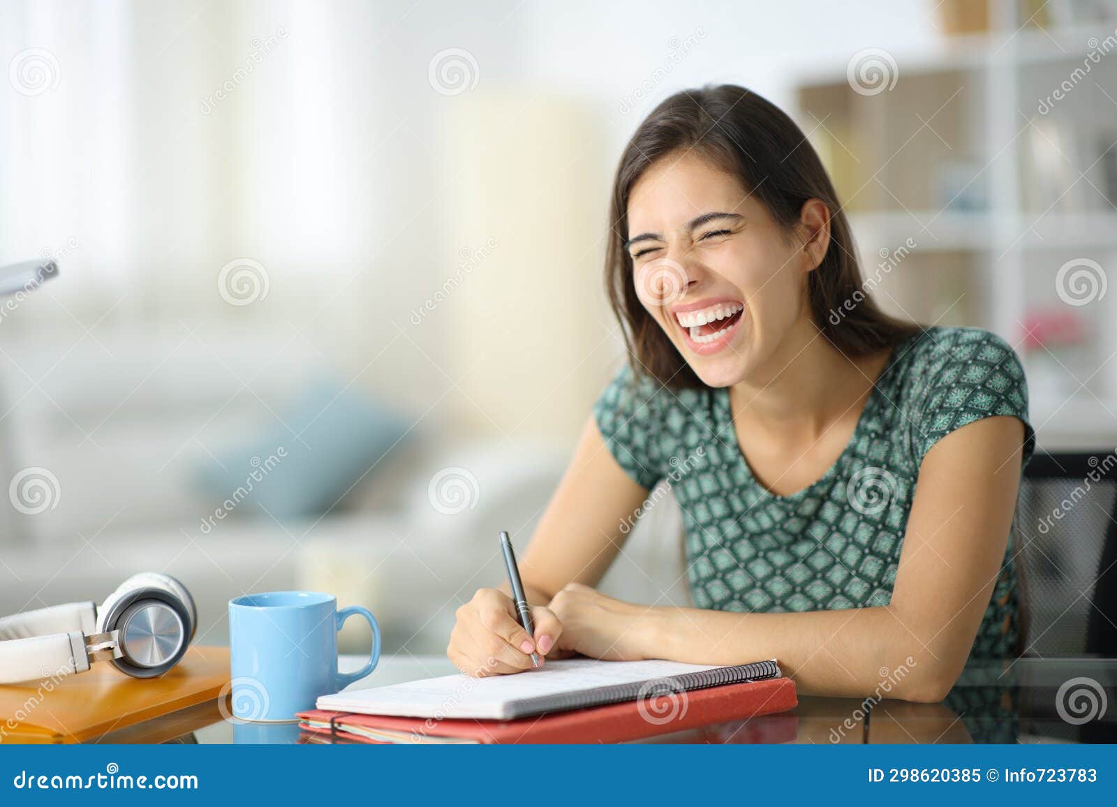 Happy Student Laughing Loud at Home Stock Image - Image of young ...