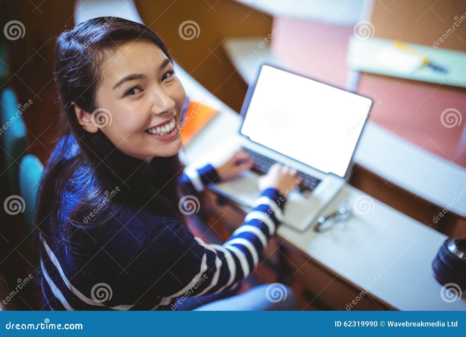 Happy Student in Lecture Hall Using Laptop Stock Photo - Image of ...