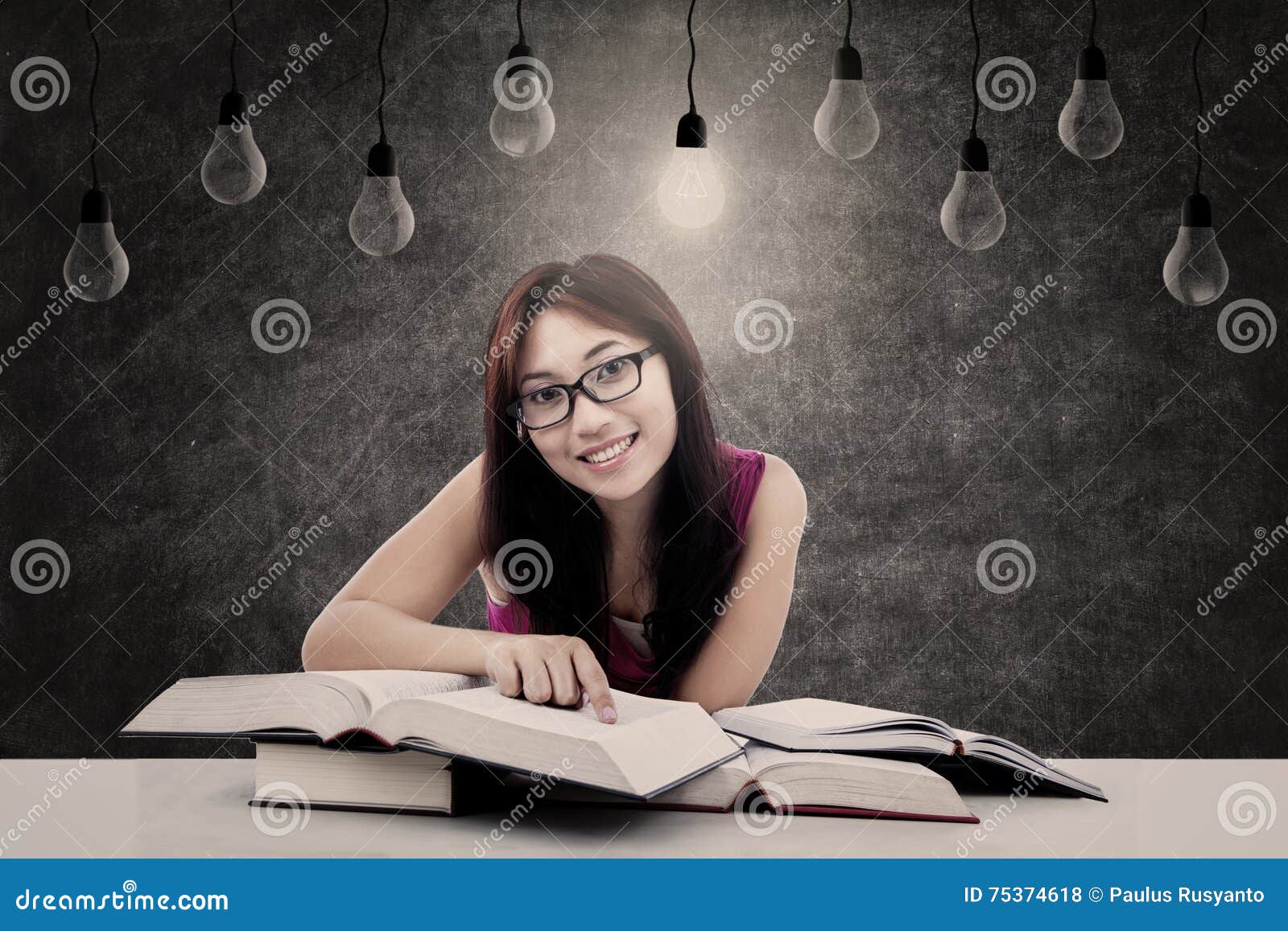 Happy Student with Lit Bulb Stock Photo - Image of asian, apprentice ...