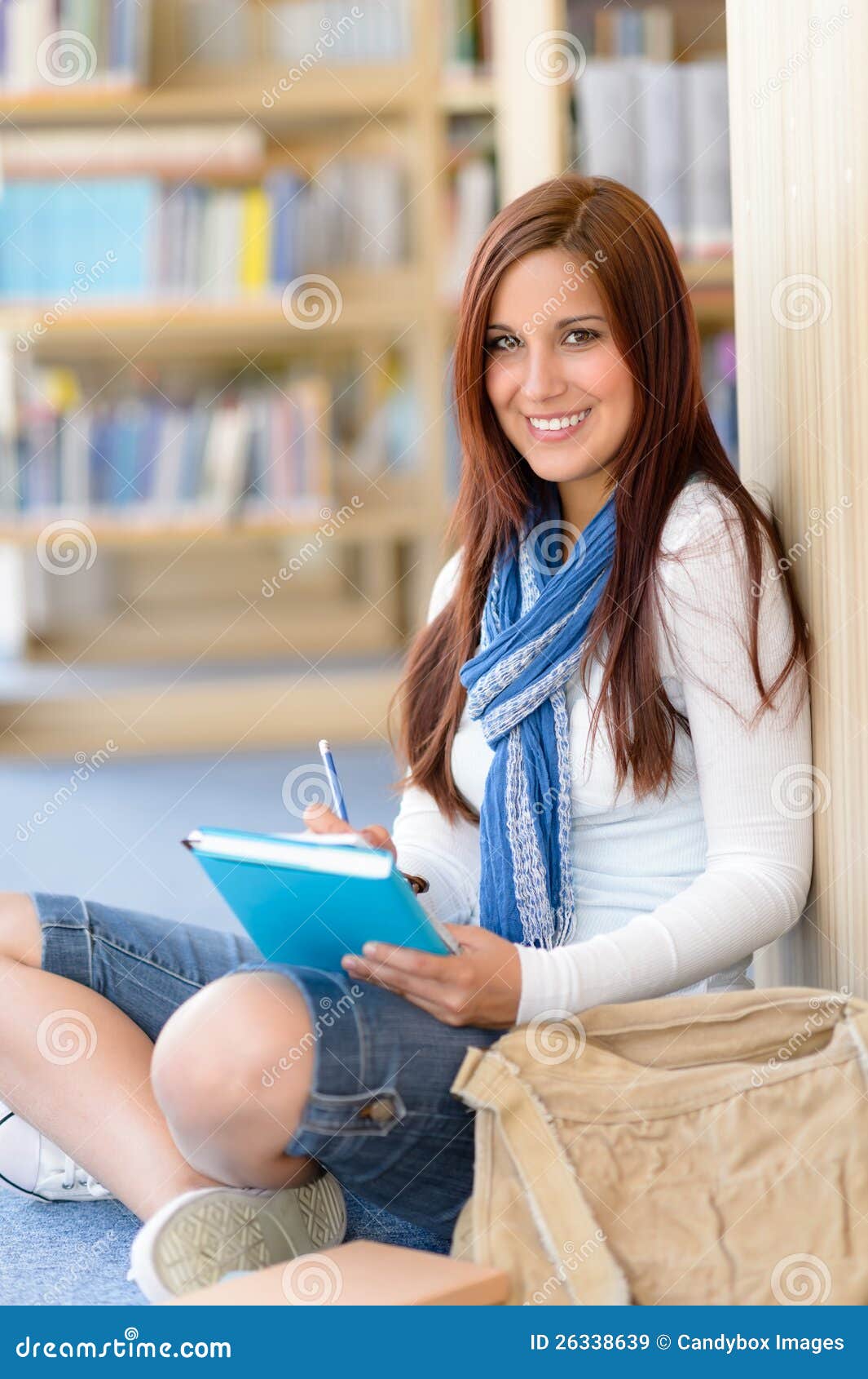 Happy Student with Notepad at High-school Library Stock Image - Image ...