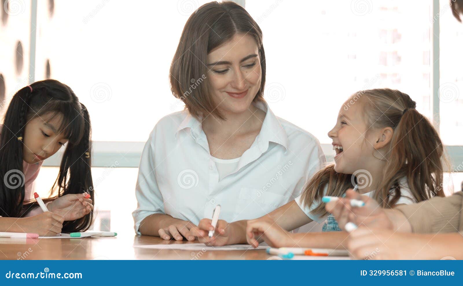 Teacher Drawing With Her Little Student At School Cute Little Boy ...
