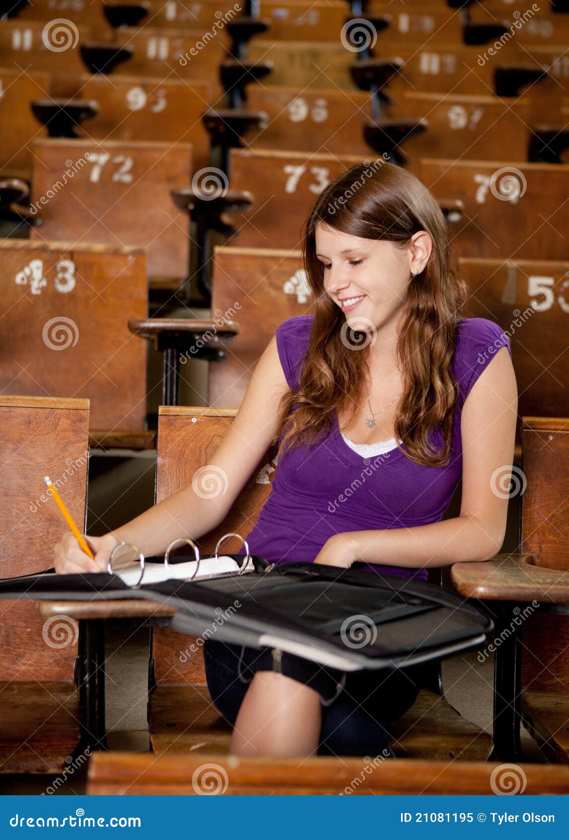 Happy Student Taking Notes stock image. Image of classroom - 21081195