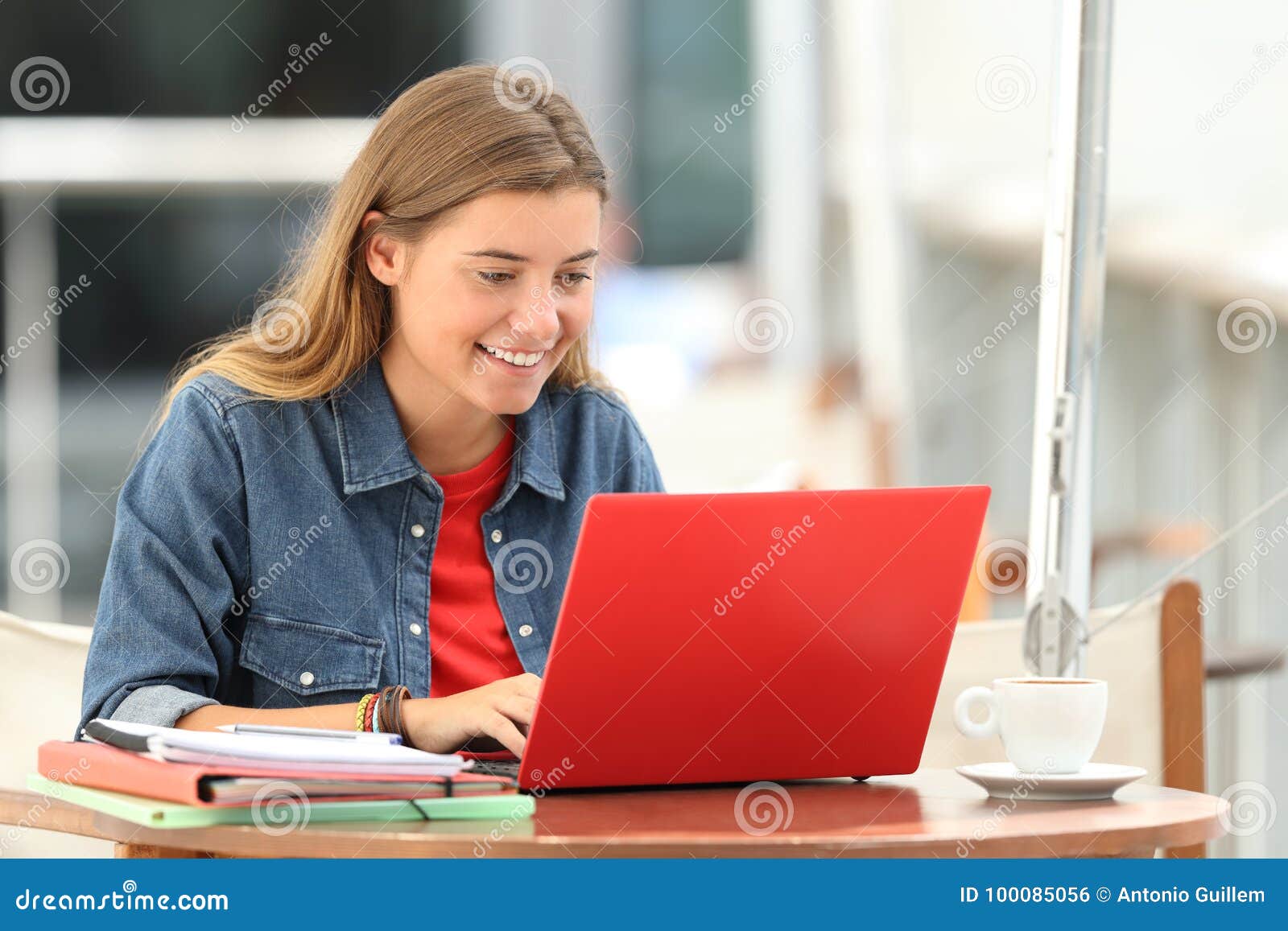 Happy Student Typing on a Laptop in a Bar Stock Photo - Image of campus ...