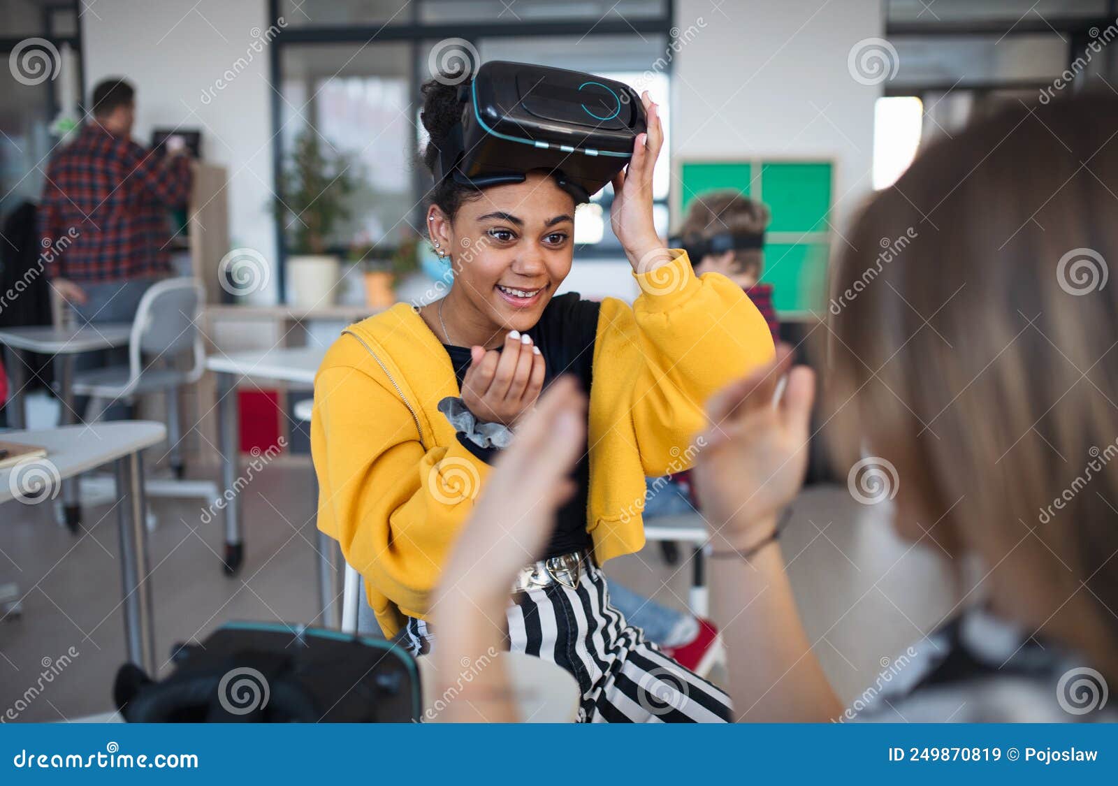 Happy Student Wearing Virtual Reality Goggles at School in Computer ...