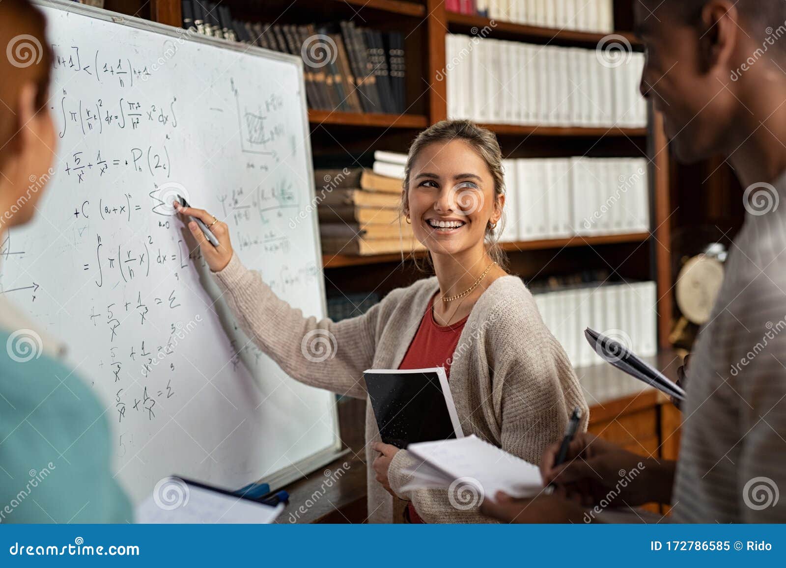 Happy Student Writing Exercise on Whiteboard Stock Image - Image of ...