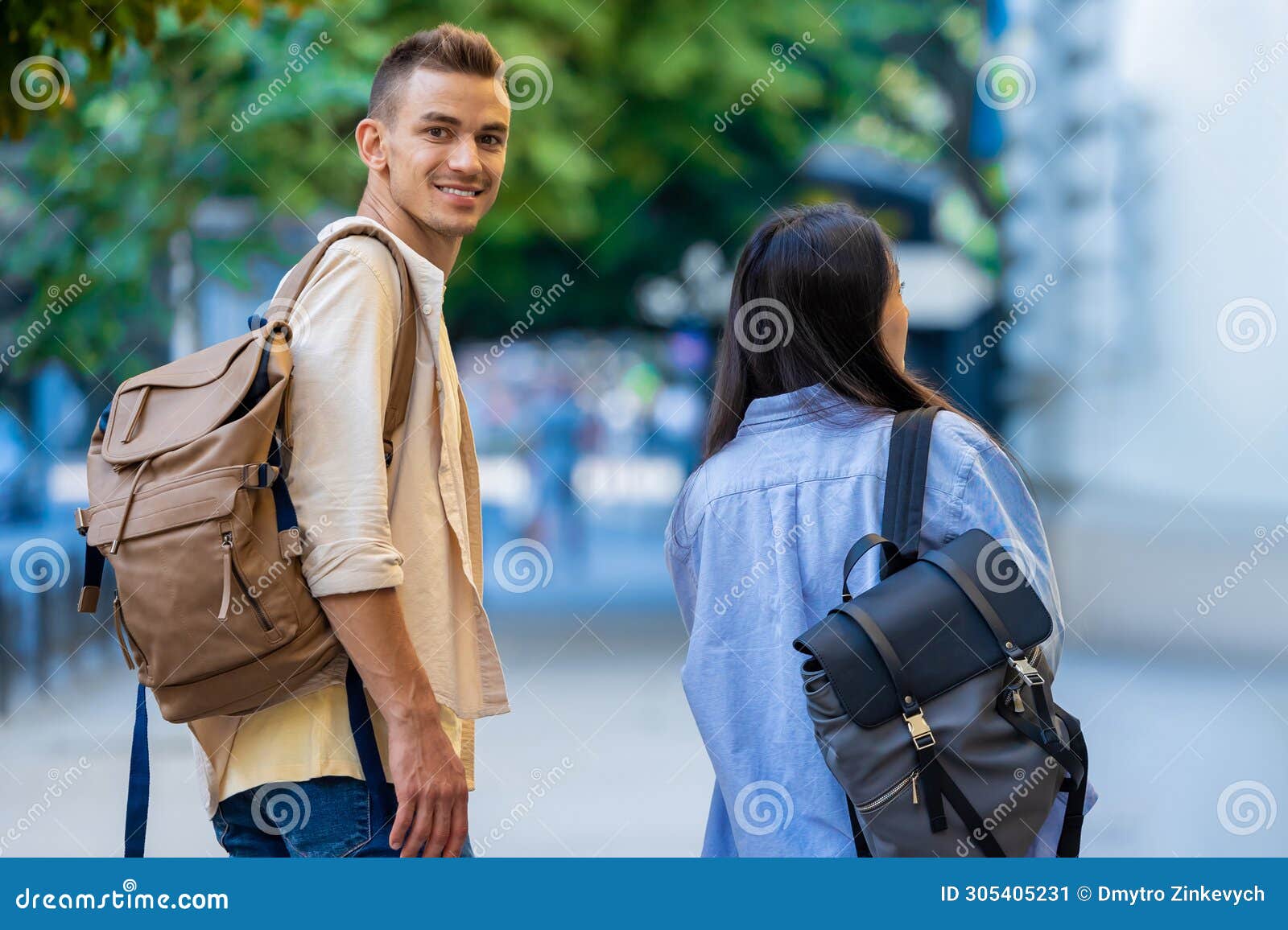 Happy Students Communicating while Walking through University Campus ...