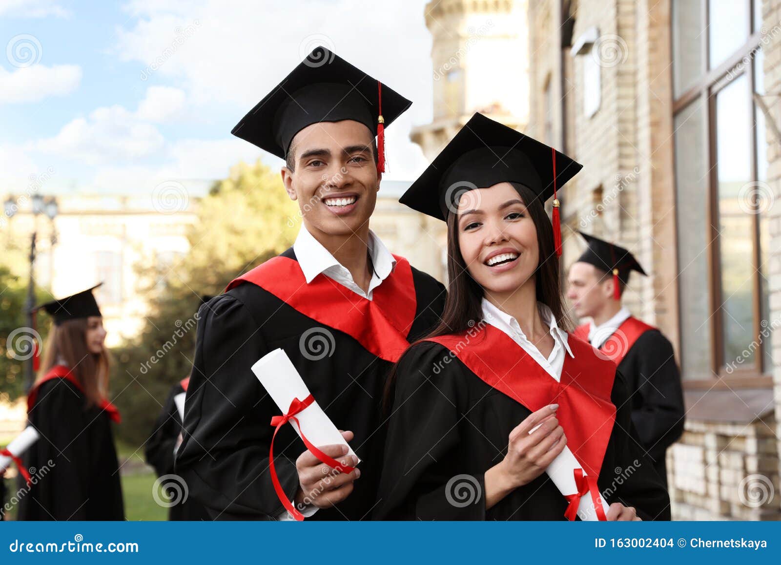 Happy Students with Diplomas. Graduation Ceremony Stock Photo - Image ...
