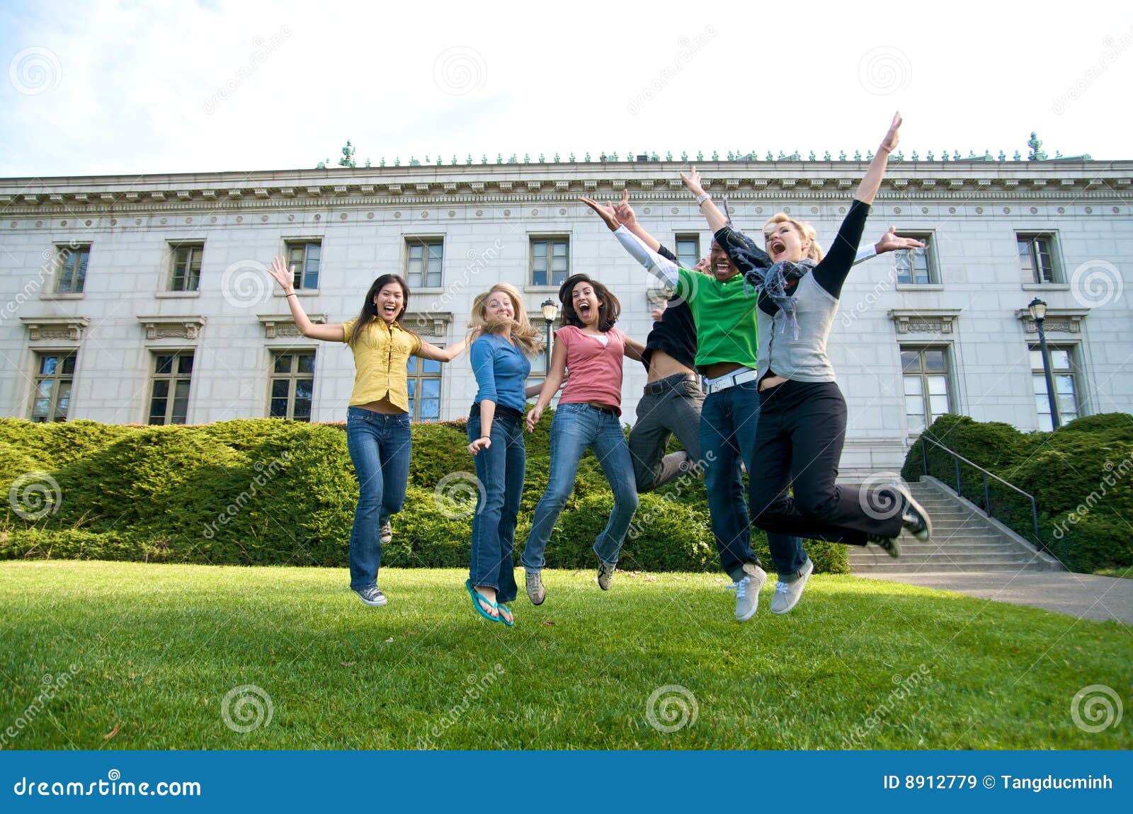 Happy students jumping stock image. Image of brown, blond - 8912779