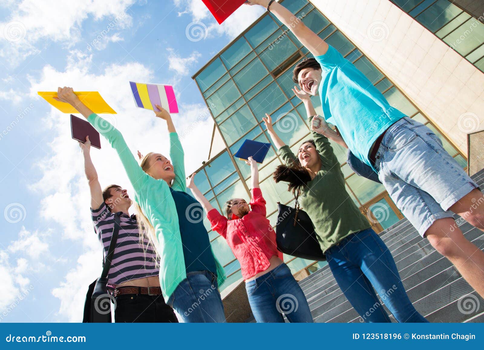 Happy Students Jumping for Joy Stock Photo - Image of college ...