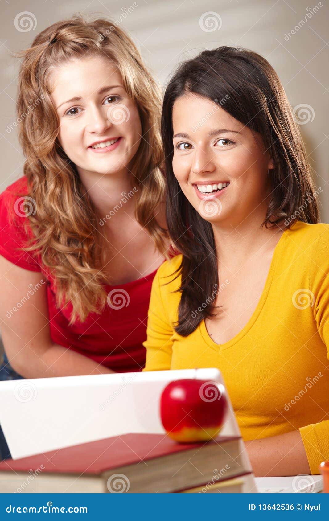 Happy students with laptop stock photo. Image of friends - 13642536
