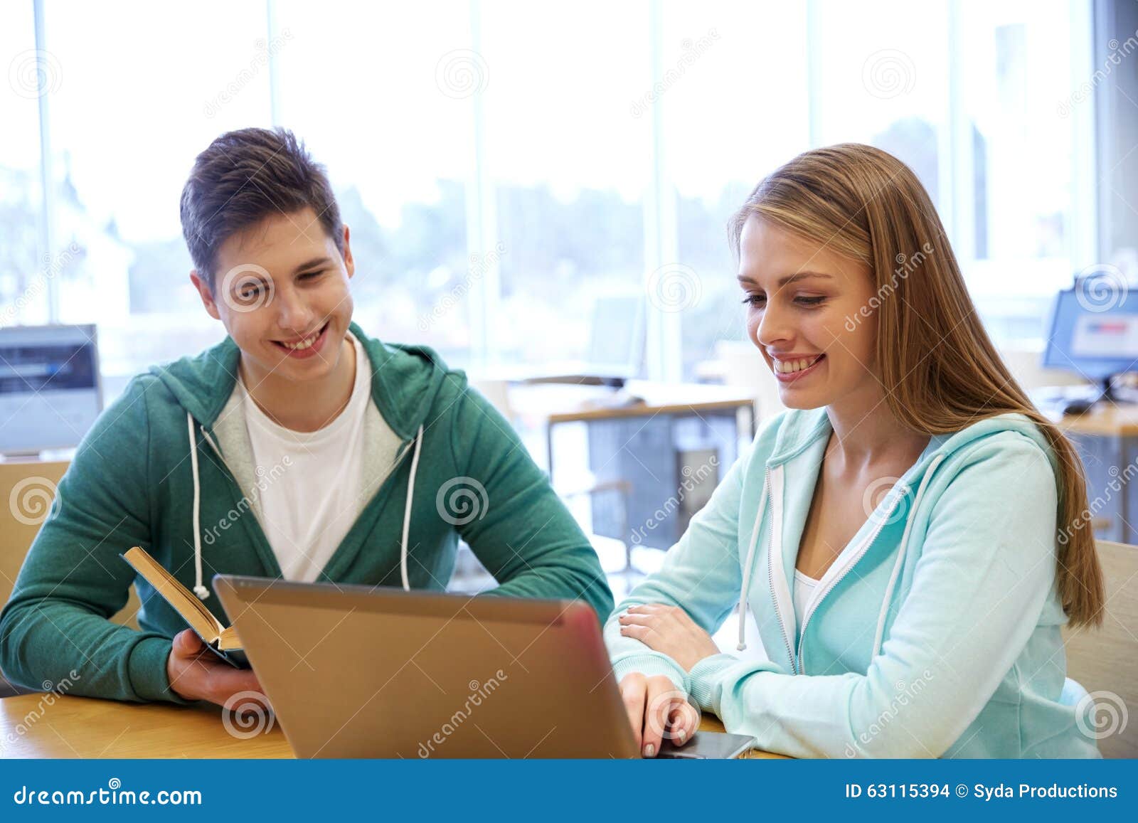 Happy Students with Laptop and Books at Library Stock Photo - Image of ...
