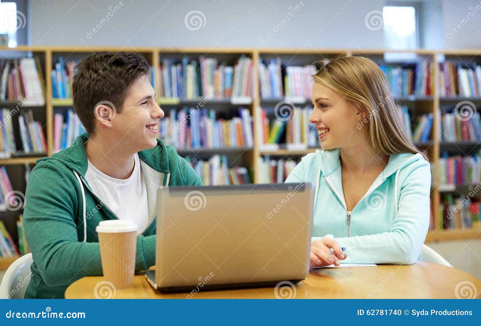 Happy Students with Laptop in Library Stock Photo - Image of literature ...