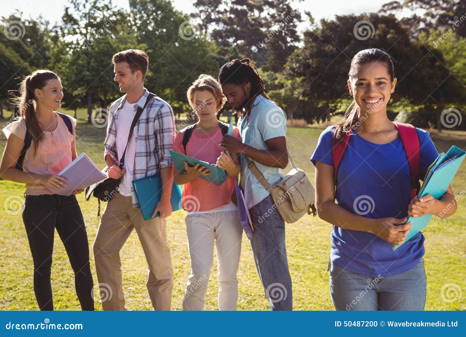 Happy Students Outside on Campus Stock Photo - Image of college ...