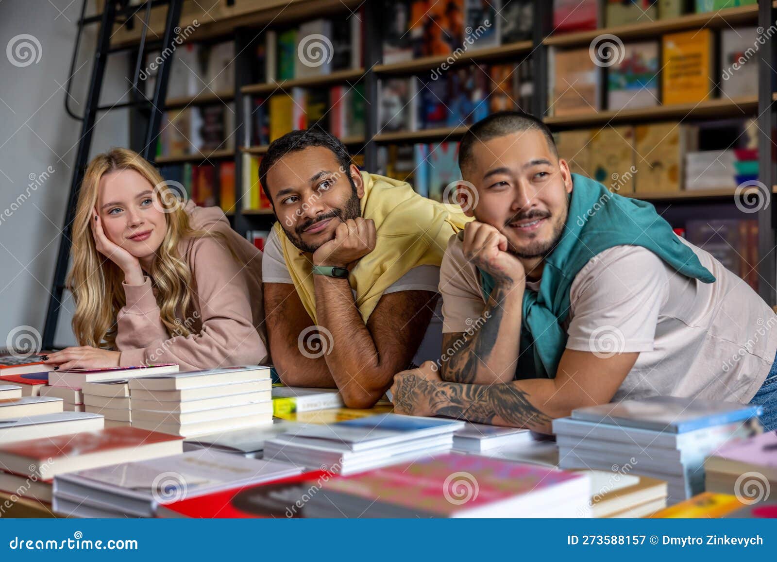 Happy Students Sitting in the Library Stock Image - Image of ...