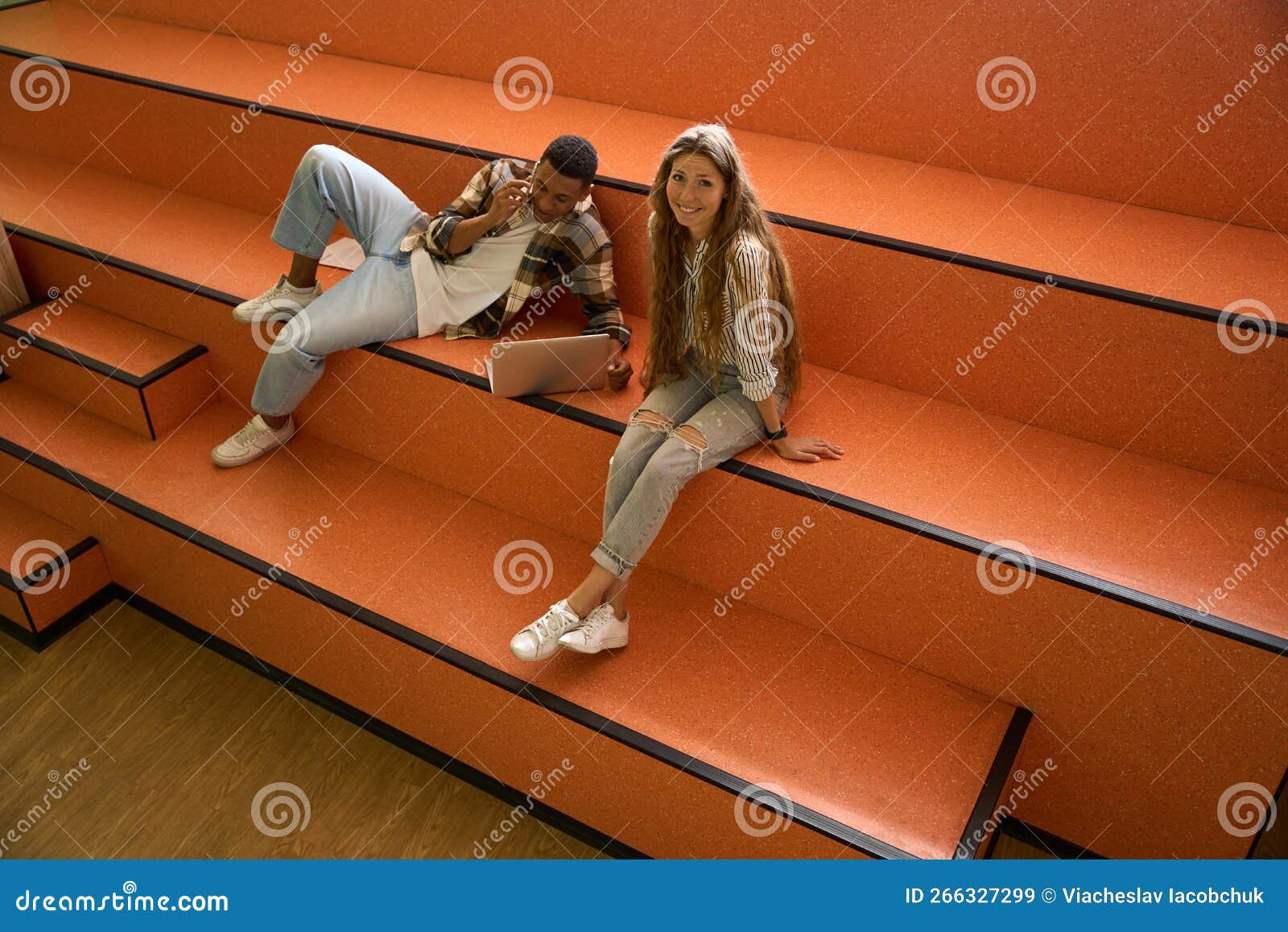 Happy Students are Sitting on Steps Together Stock Image - Image of ...