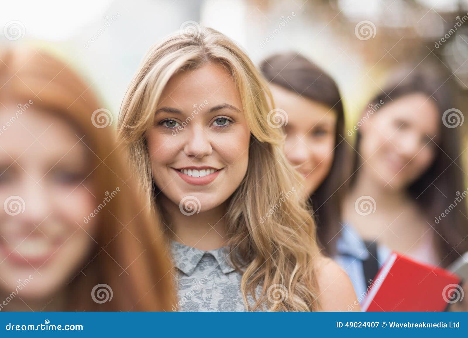Happy Students Smiling at Camera in a Row Stock Image - Image of ...