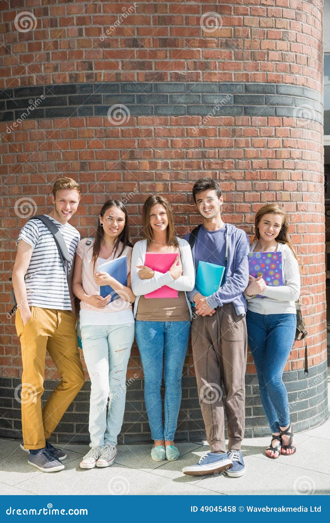 Happy Students Smiling at Camera Stock Photo - Image of camera, girl ...