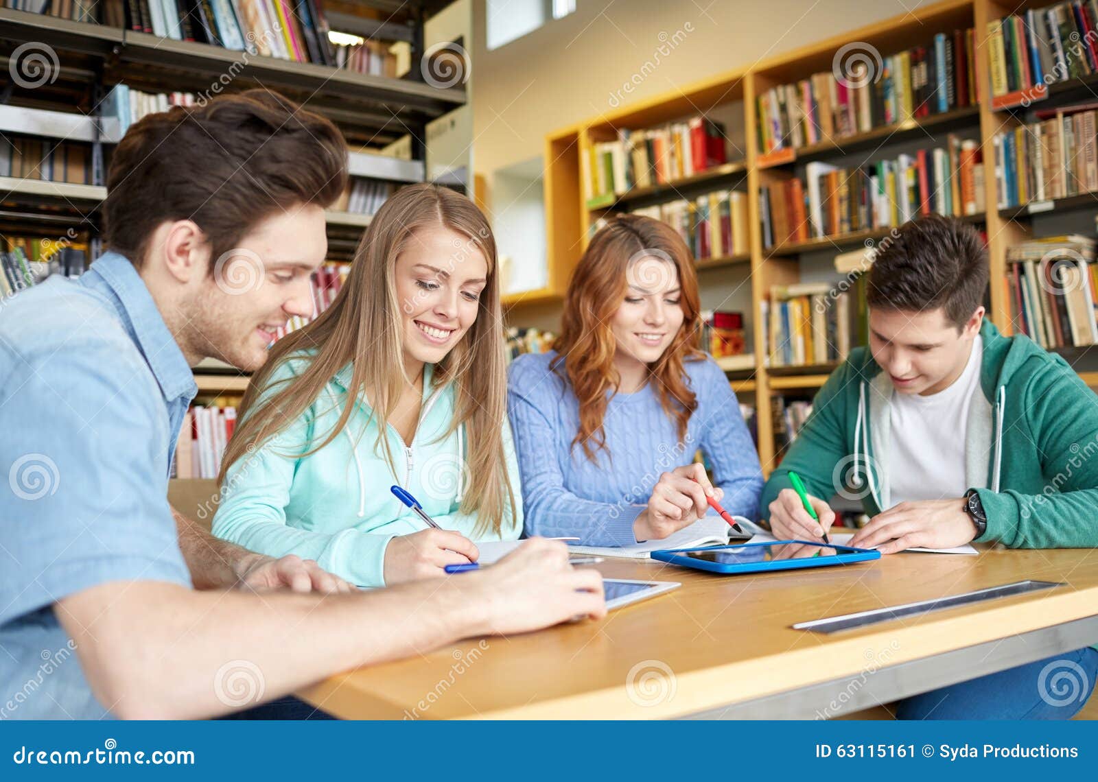 Happy Students with Tablet Pc in Library Stock Image - Image of happy ...