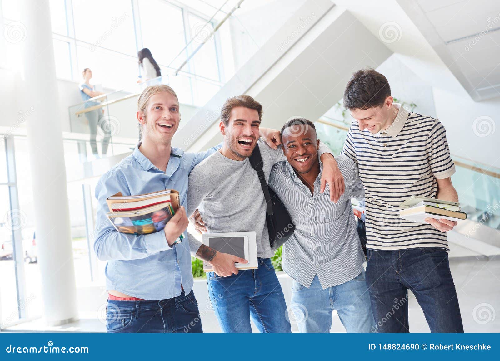 Happy students team in uni stock photo. Image of students - 148824690