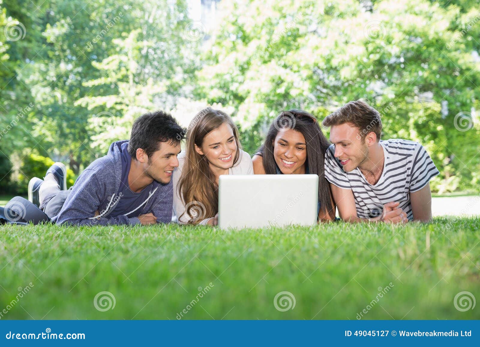 Happy Students Using Laptop Outside Stock Image - Image of adult ...