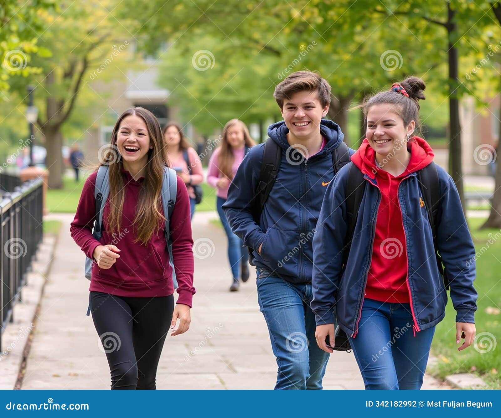 Happy Students Walking Together Outdoors, Embracing Friendship and Joy ... Happy Students Walking Together Outdoors, Embracing Friendship and Joy ...