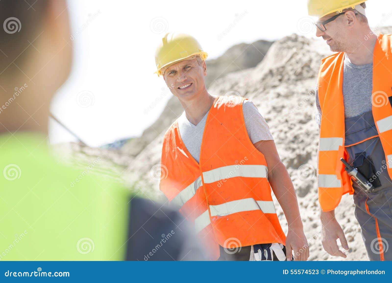 Happy Supervisor with Colleague at Construction Site Stock Image ...